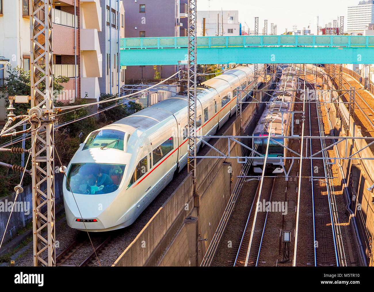 A unique scene of two trains passing at two different levels, high ...