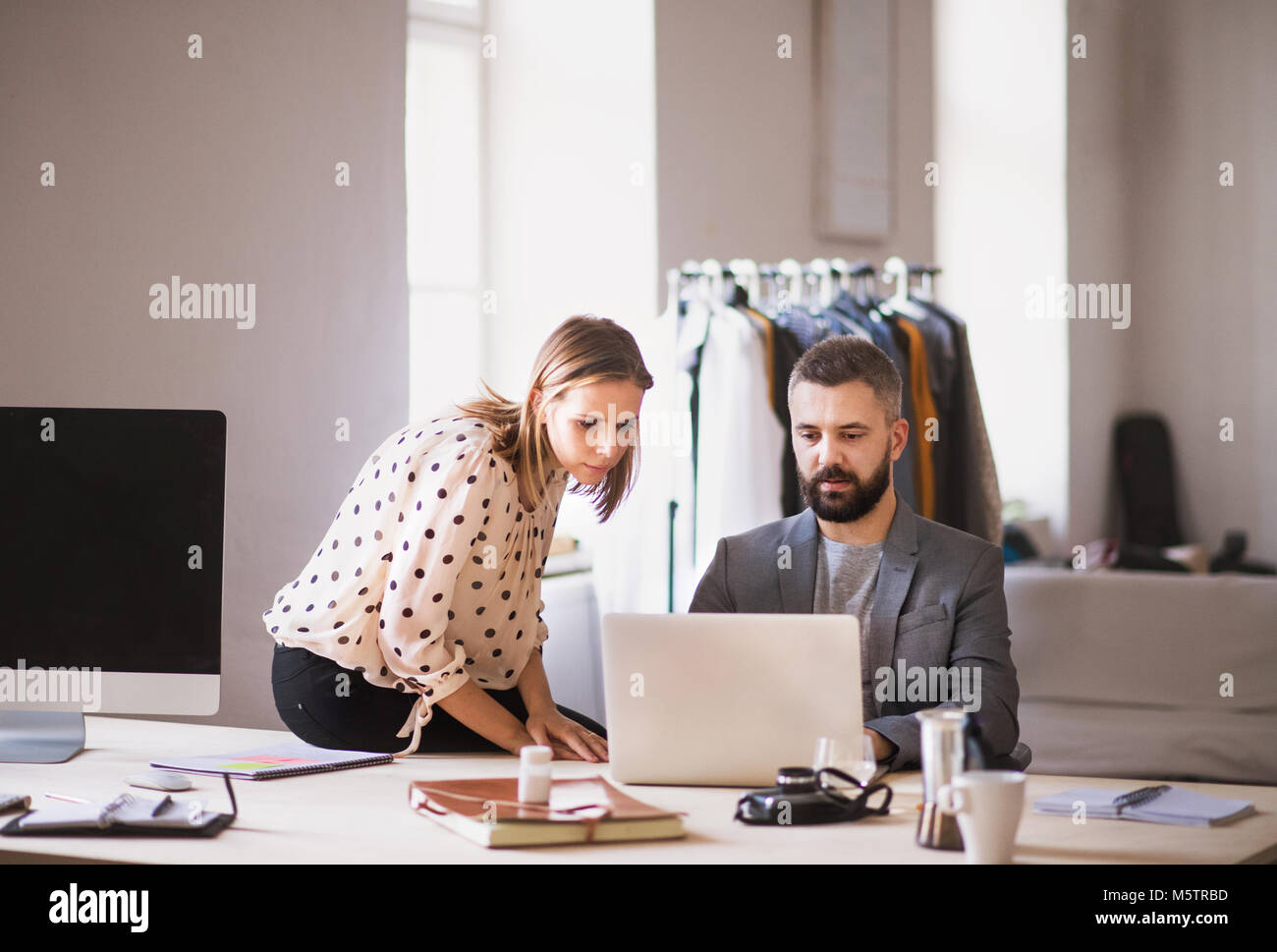 Two business people in the office Stock Photo - Alamy