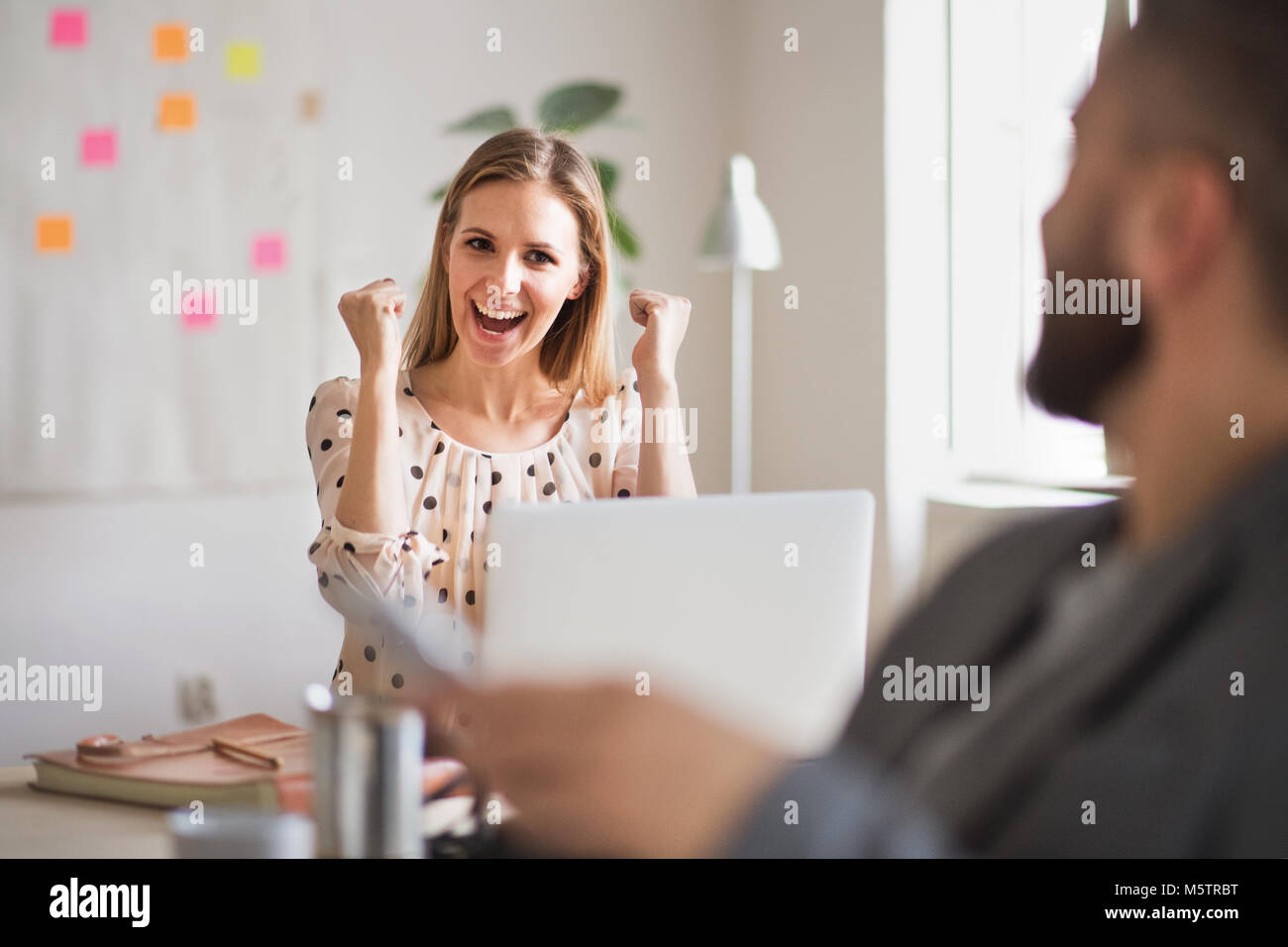 Two business people in the office Stock Photo - Alamy