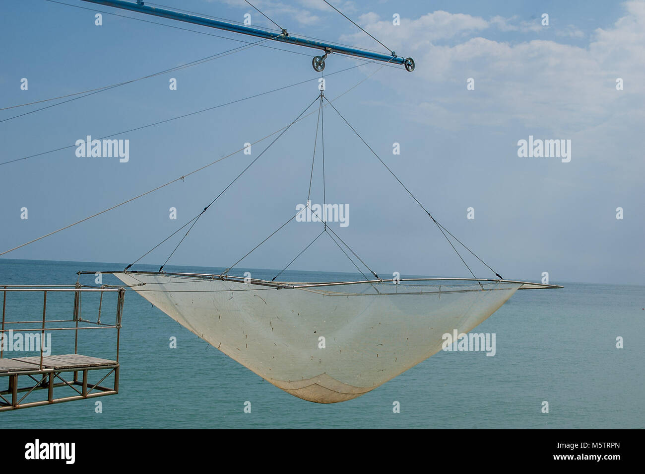 fishing nets suspended Stock Photo - Alamy