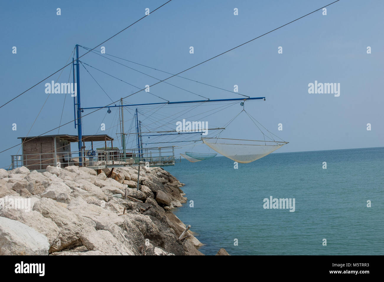 fishing nets suspended Stock Photo - Alamy