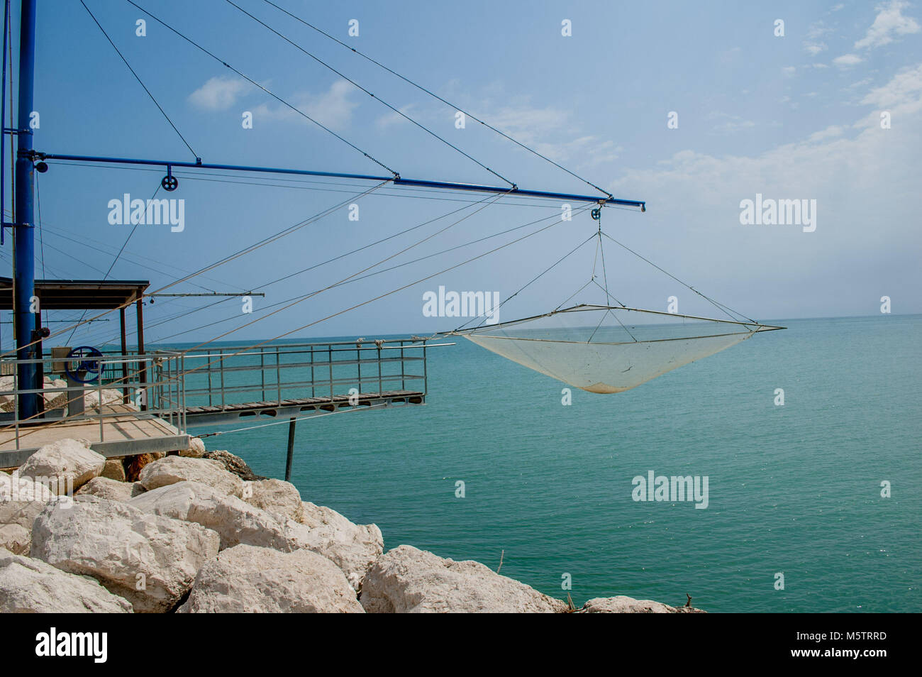 fishing nets suspended Stock Photo - Alamy