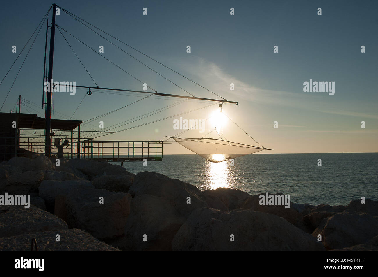fishing nets suspended Stock Photo - Alamy