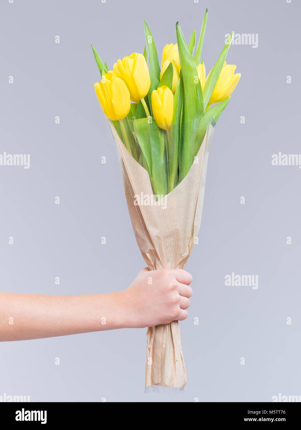 Hand with flowers Stock Photo - Alamy