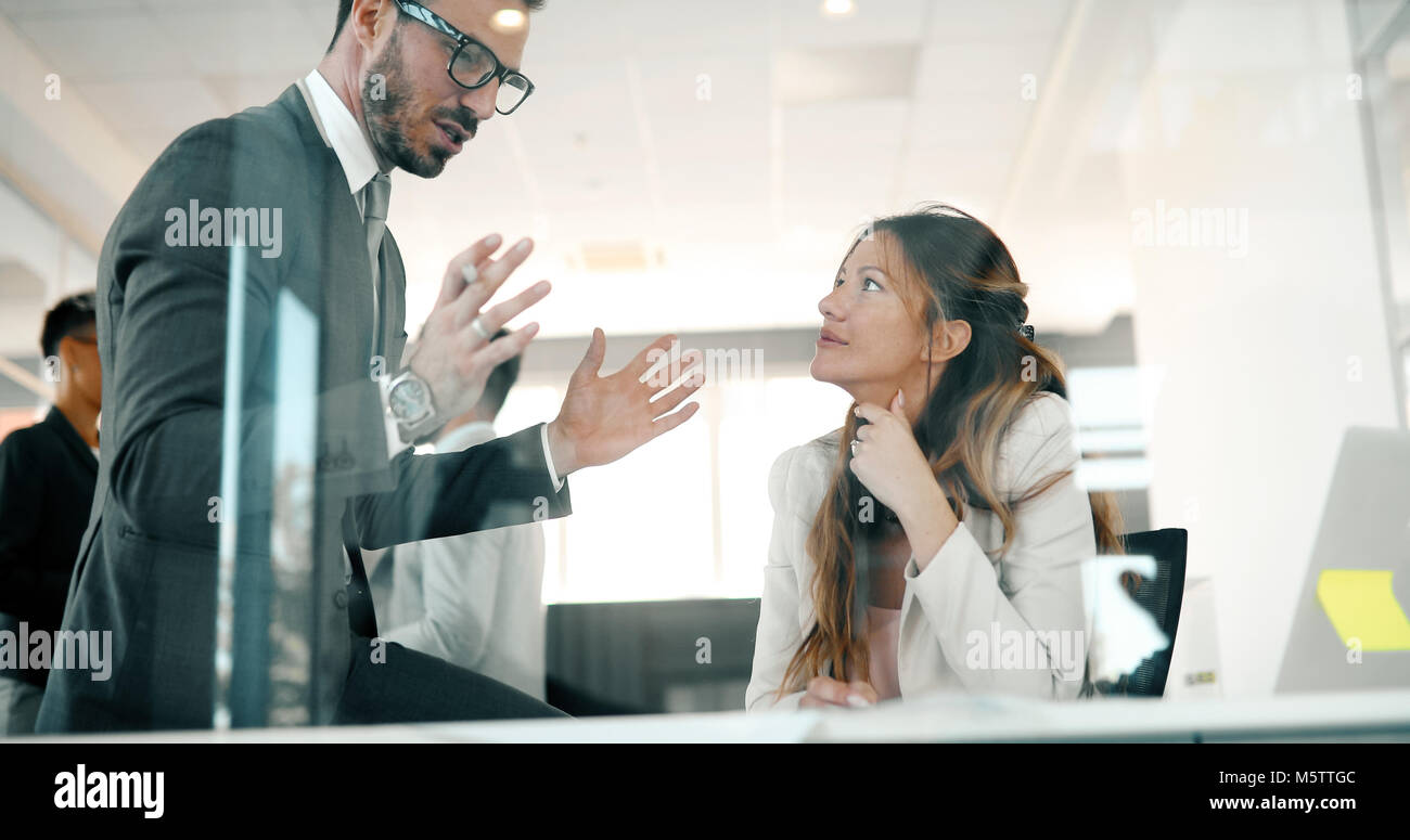Business colleagues having conversation during coffee break Stock Photo ...