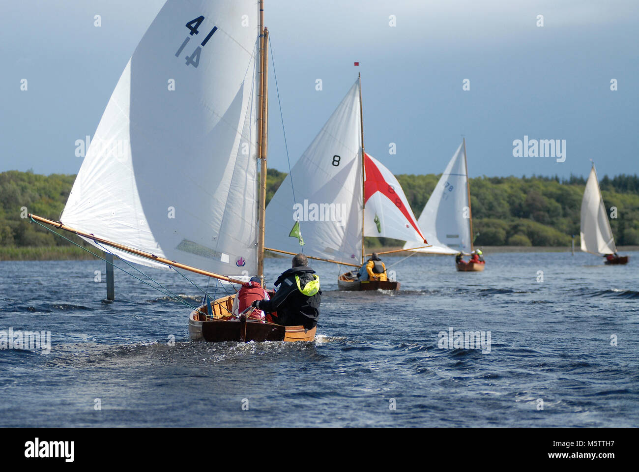 Albert Schiess's Water Wag (left) and the fleet race to Roosky during ...