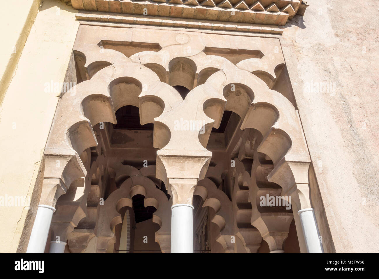 Historic monument, La Alcazaba,palatial fortification. Multifoil arch ...