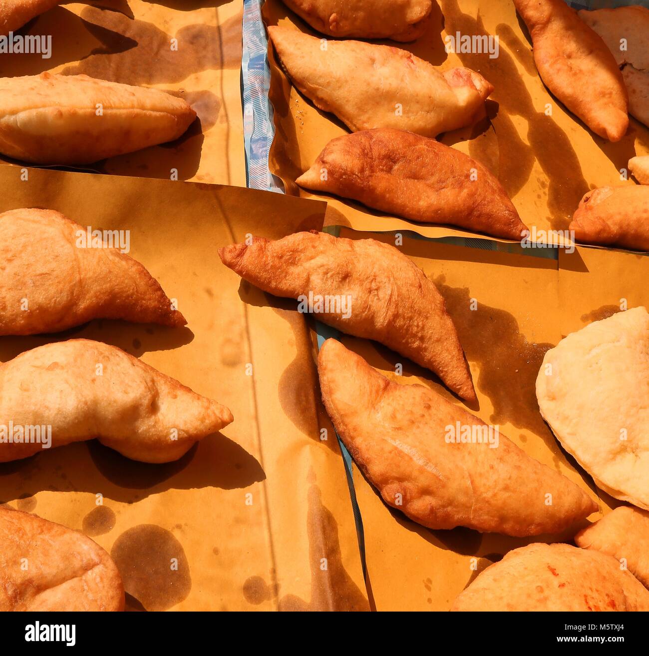 stuffed fried bread called Panzerotti with tomato and cheese Stock ...