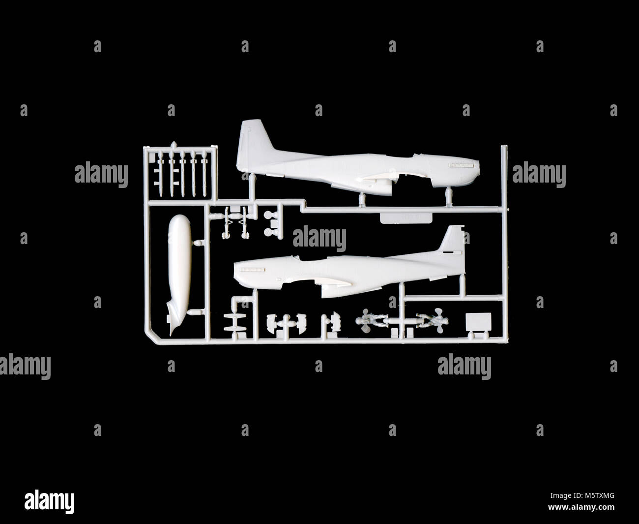 An unassembled plastic model kit of a vintage triplane airplane Stock ...
