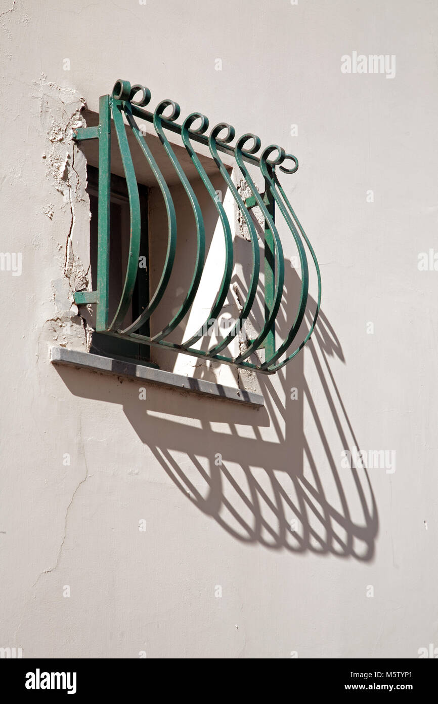 Wrought iron window bars hi-res stock photography and images - Alamy