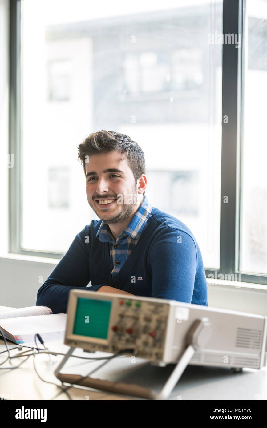 a young middle eastern science student is photographed in the physics ...