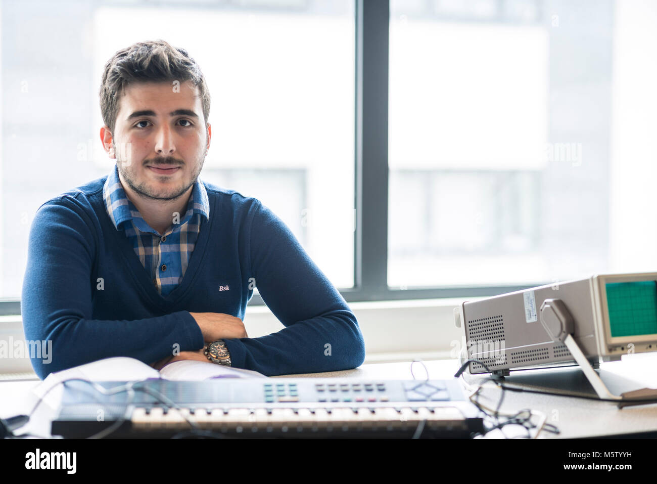 a young middle eastern science student is photographed in the physics ...