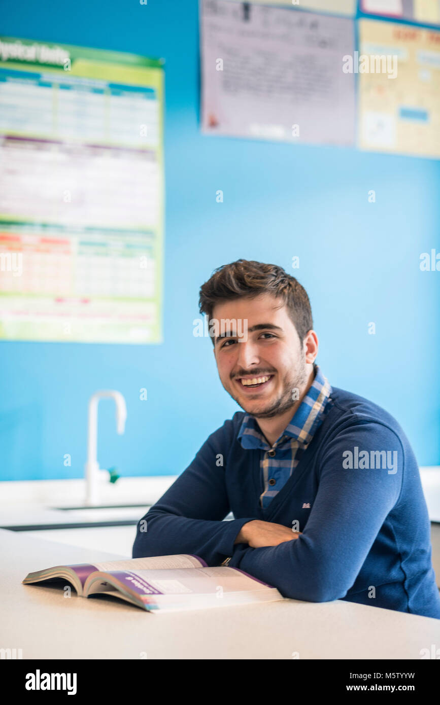 a young middle eastern science student is photographed in the physics ...