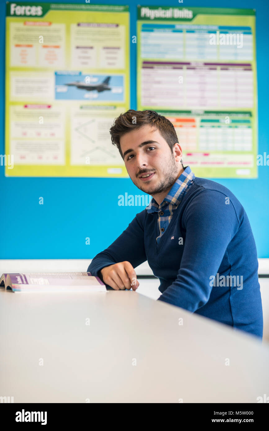 a young middle eastern science student is photographed in the physics ...