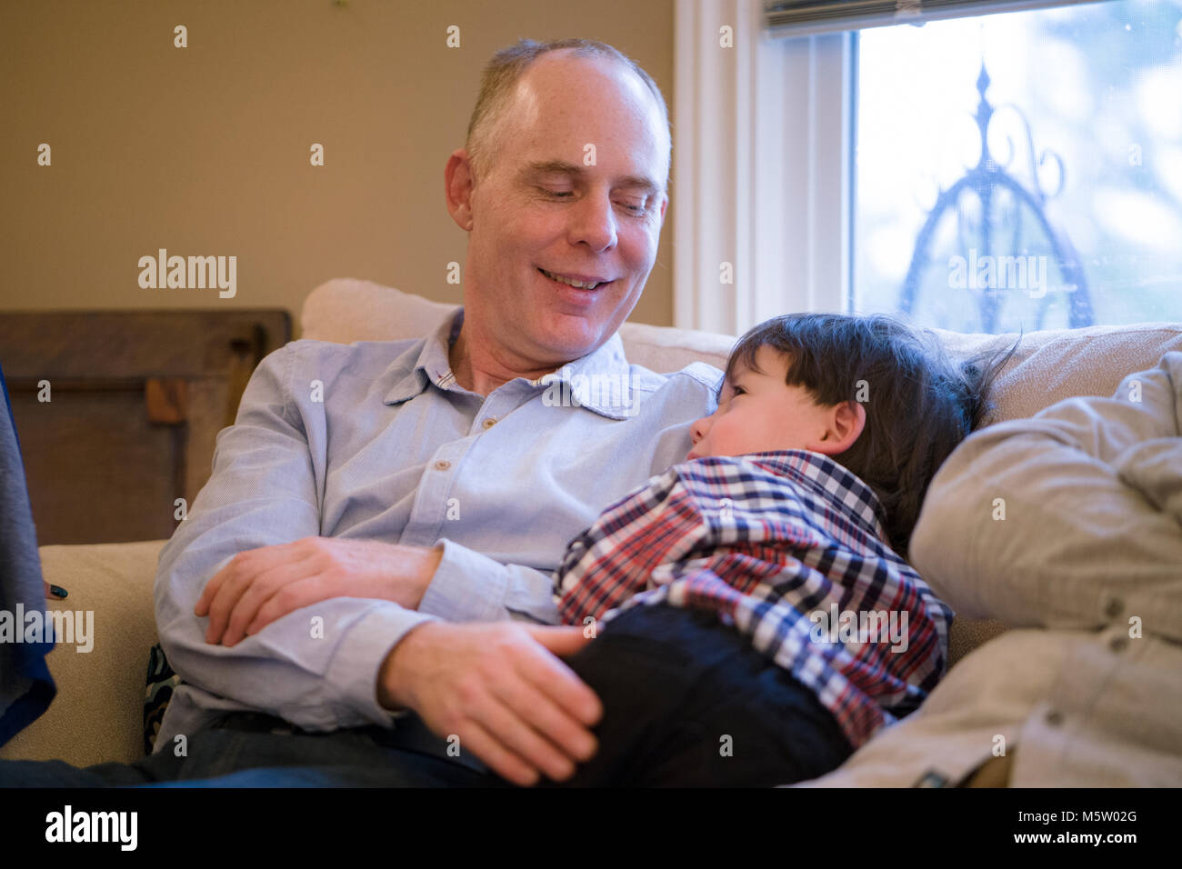 Father and son bonding Stock Photo - Alamy