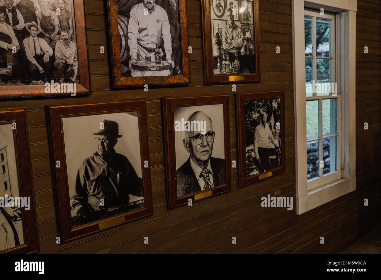 Historic photos in frames on a wall at the Jack Daniels Distillery ...