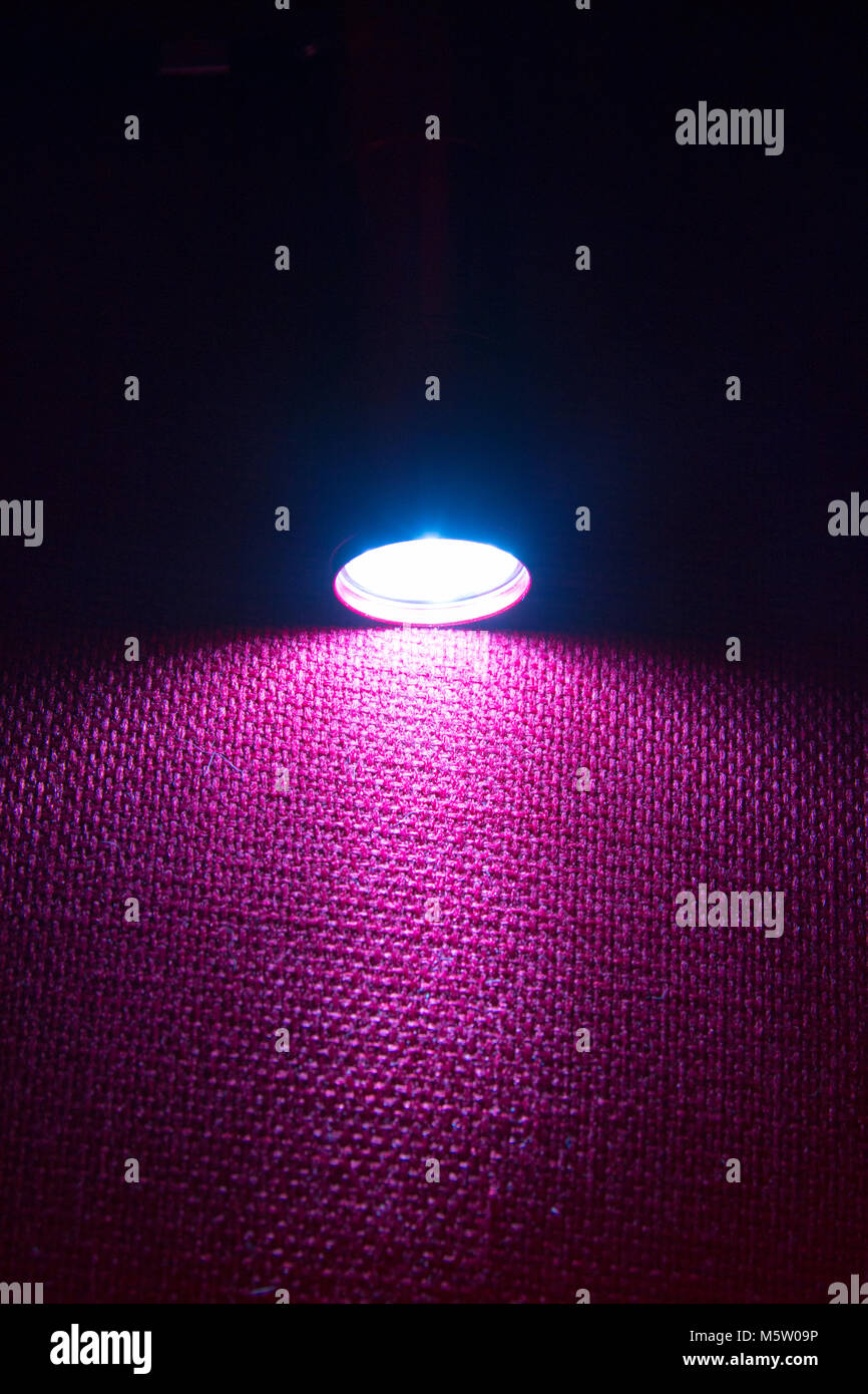 Torch light with pink background Stock Photo - Alamy
