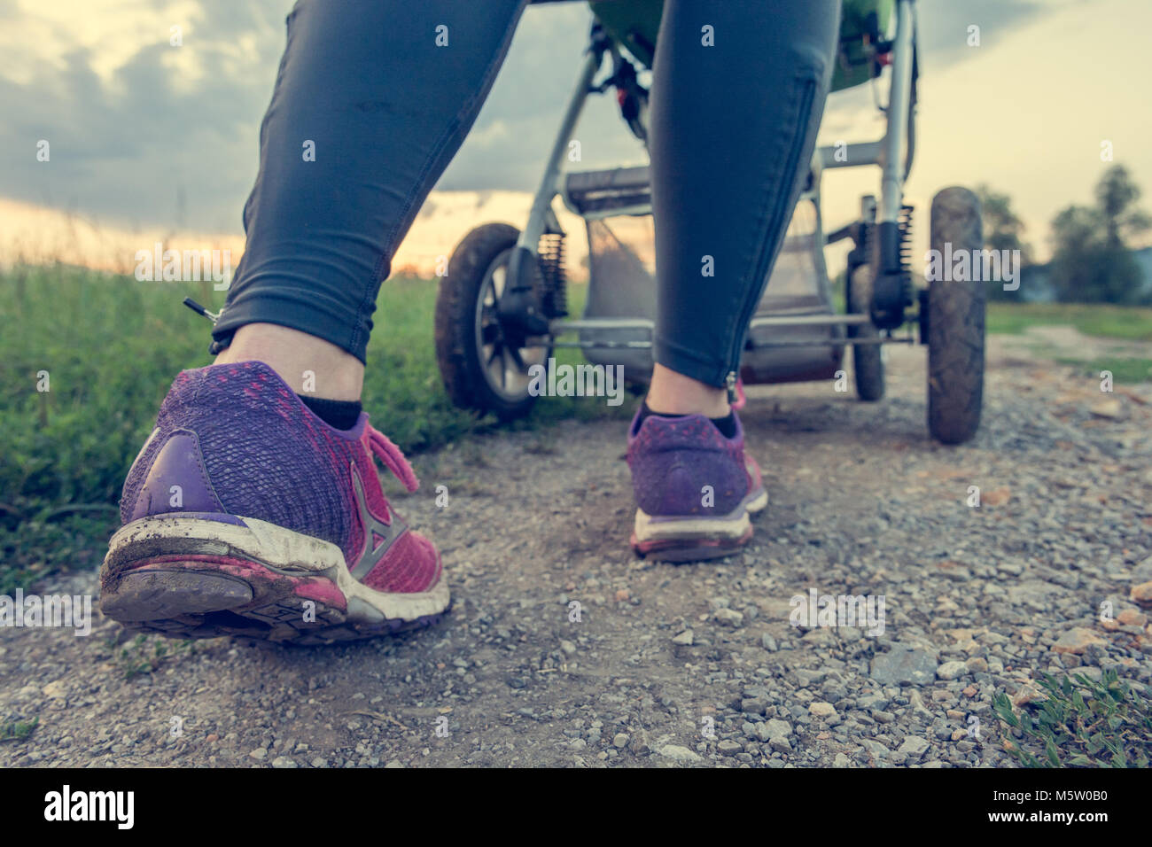 Jogging mother stroller hi-res stock photography and images - Alamy