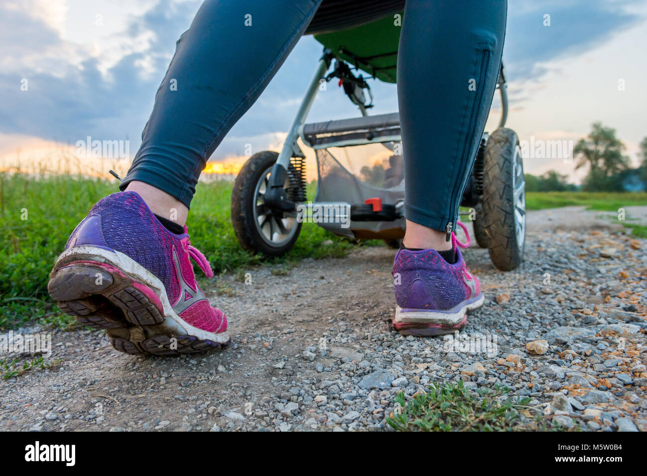 Jogging mother stroller hi-res stock photography and images - Alamy