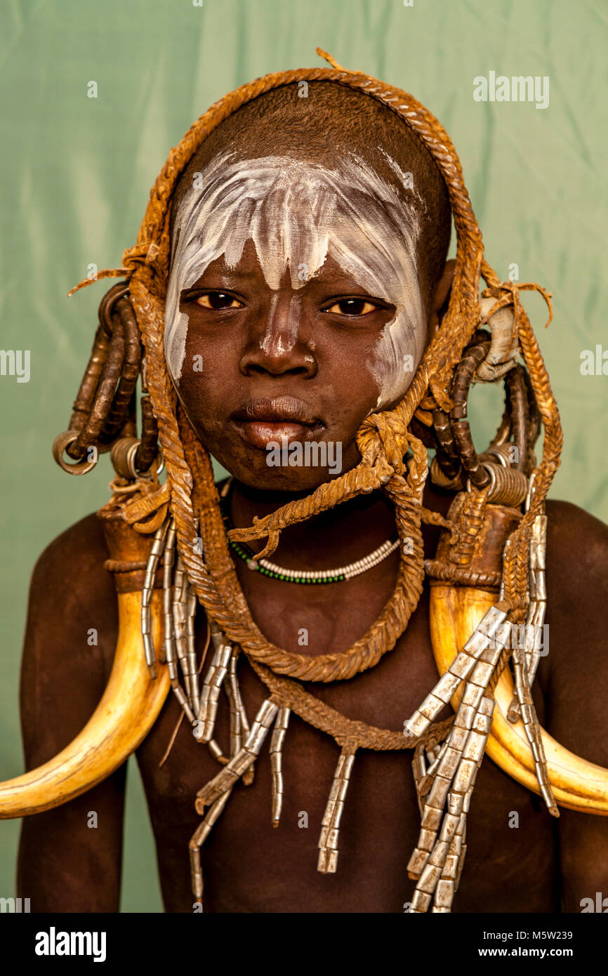 A Portrait Of A Boy From The Mursi Tribe, Mursi Village, Omo Valley ...