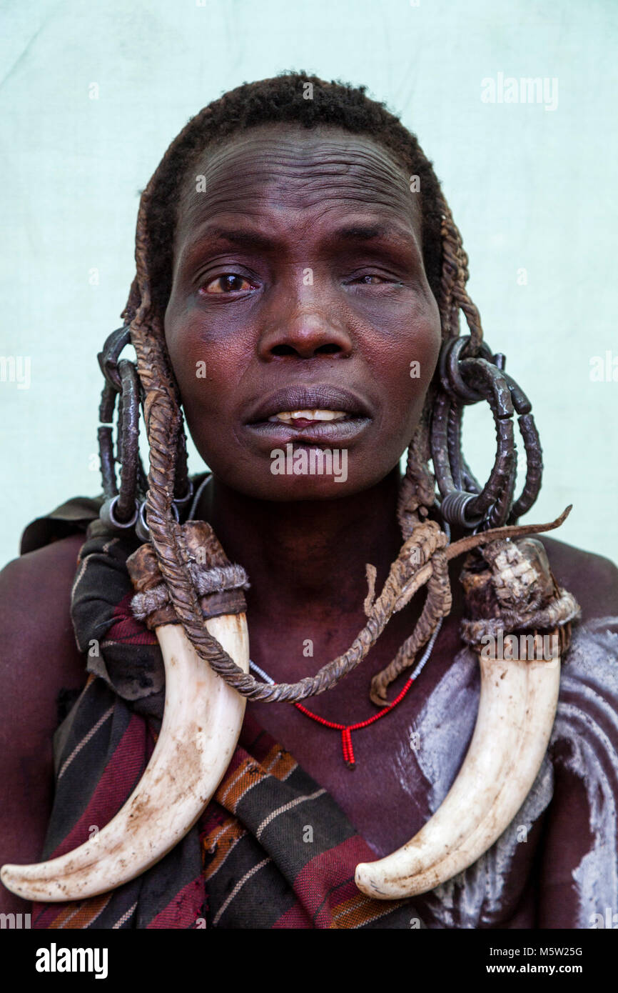 A Portrait Of A Woman From The Mursi Tribe, Mursi Village, Omo Valley ...
