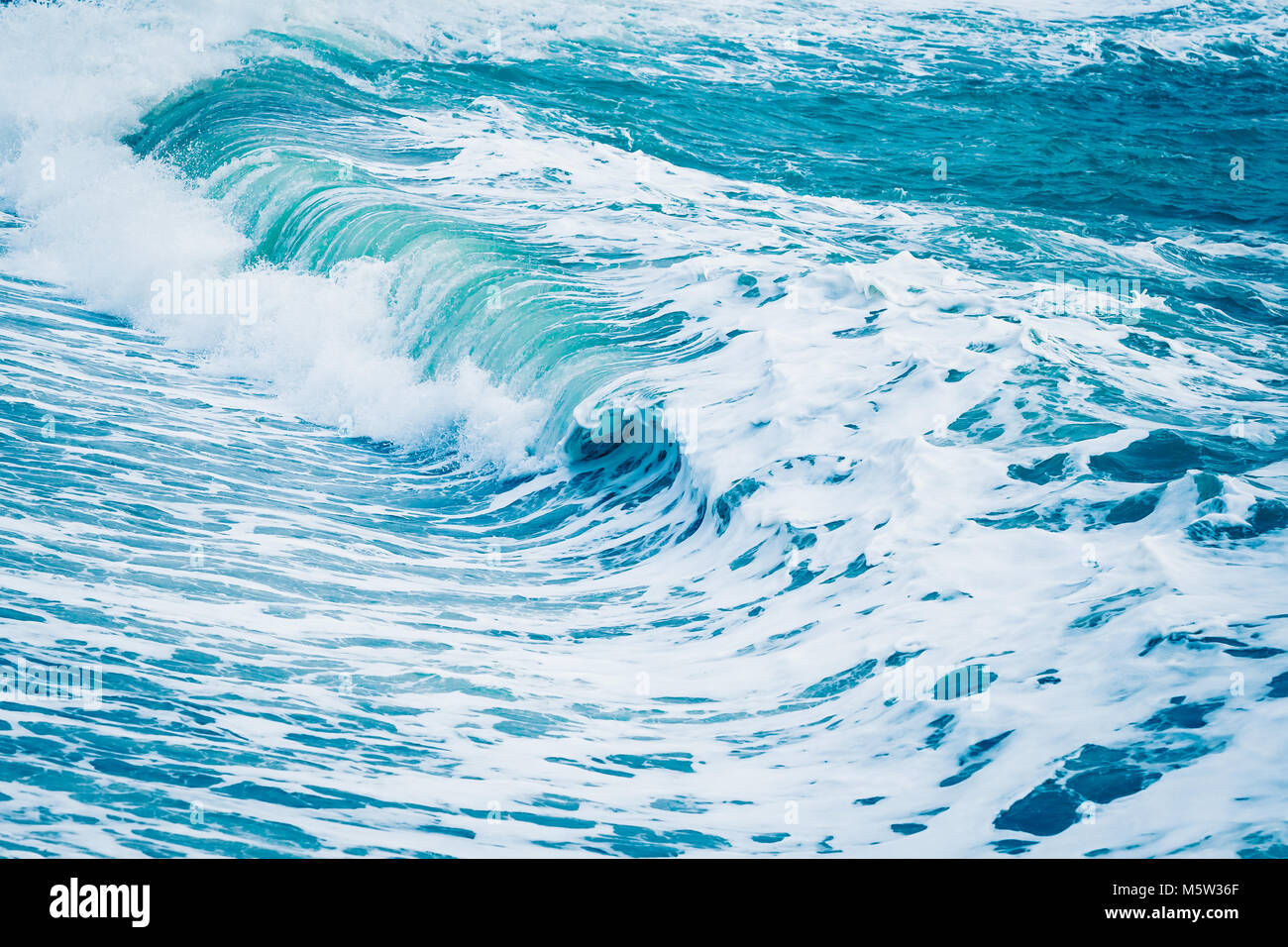 ocean waves breaking natural background Stock Photo - Alamy