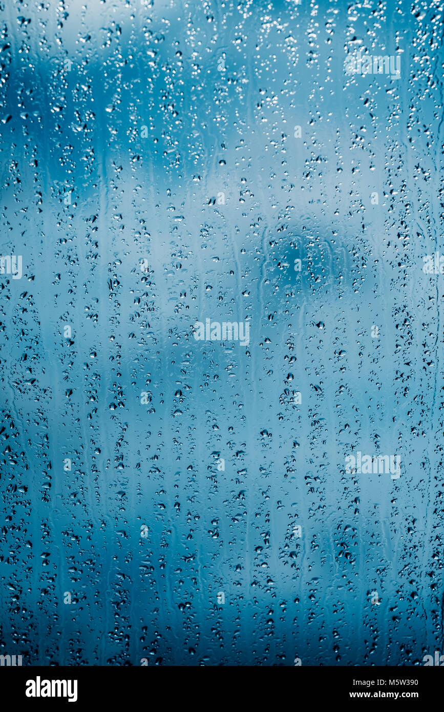 water drops of rain on a window glass. Rainy day Stock Photo - Alamy