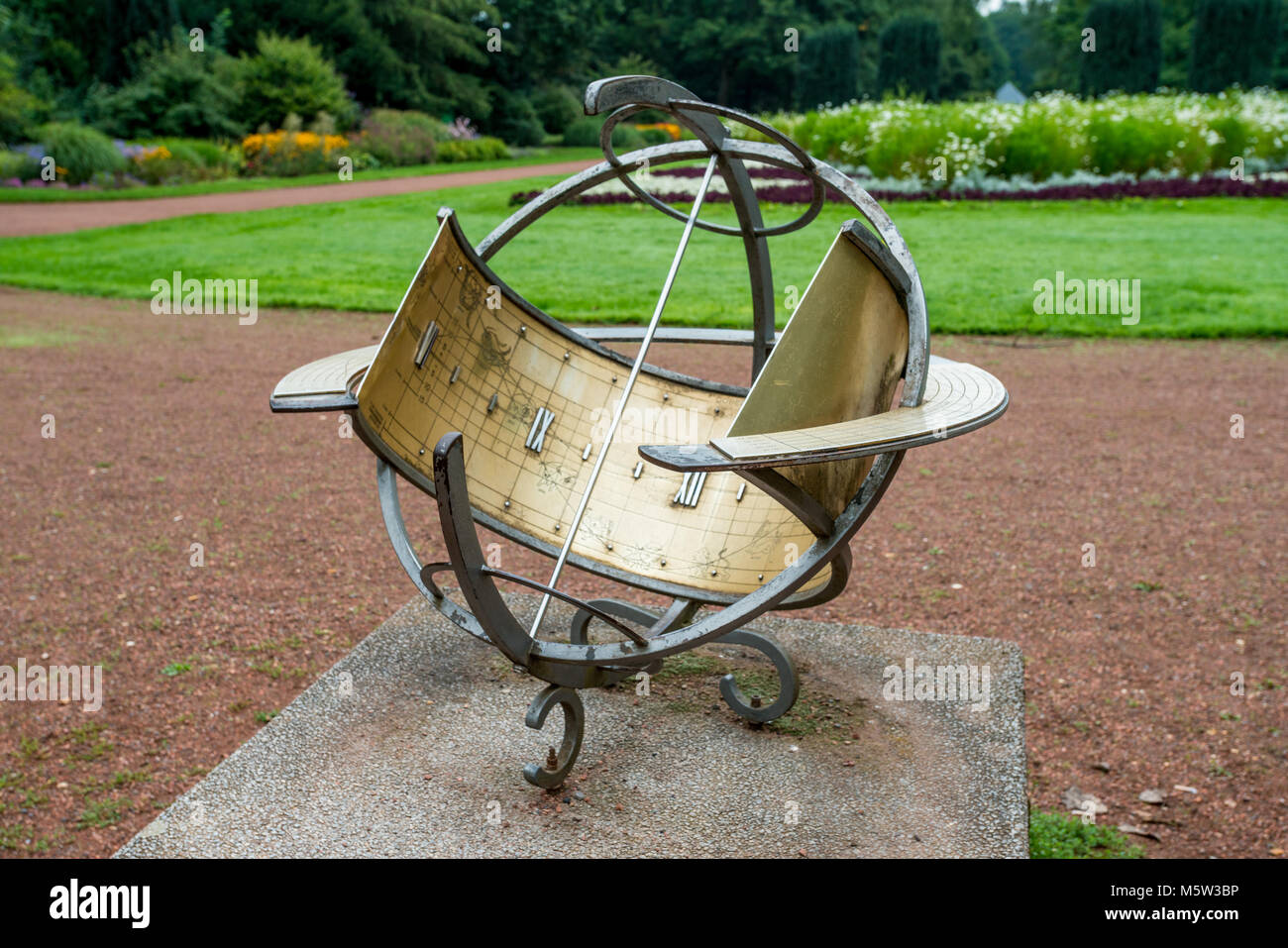 sundial. old sun clock dial in a garden Stock Photo - Alamy