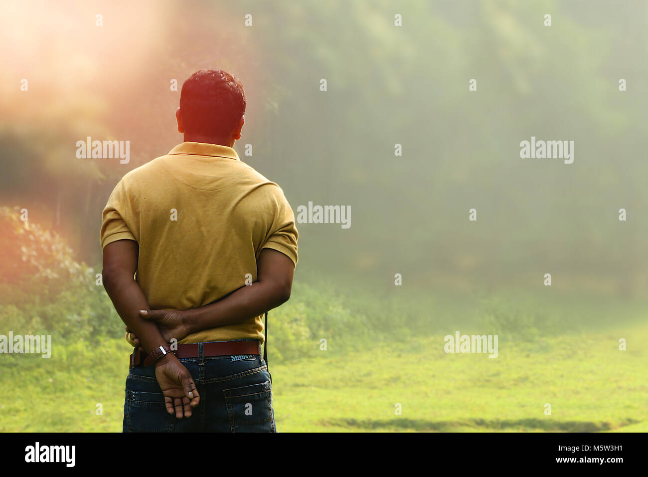 Back turned away from camera hi-res stock photography and images - Alamy
