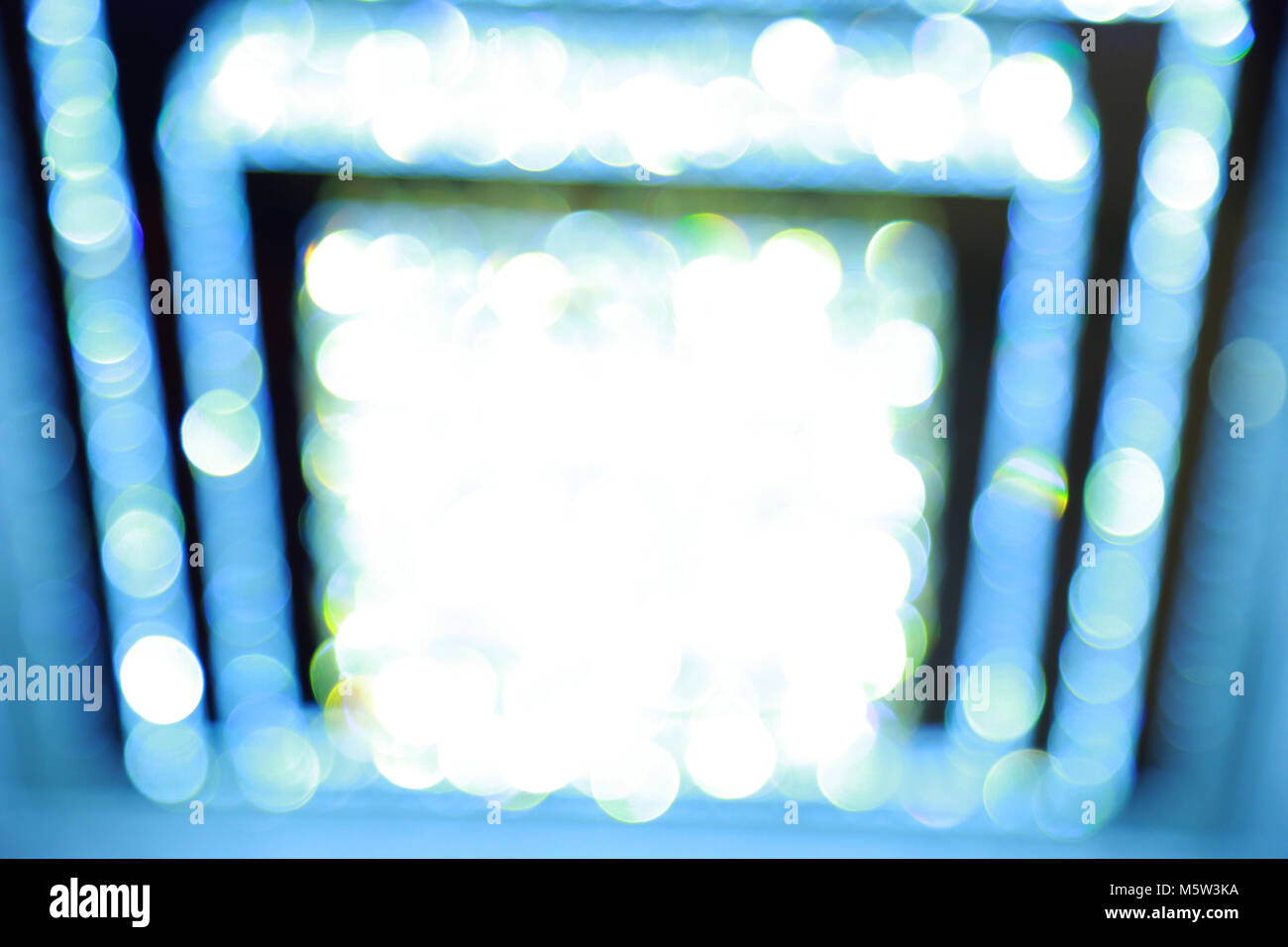 Abstract blue light blurry frame with white background Stock Photo - Alamy