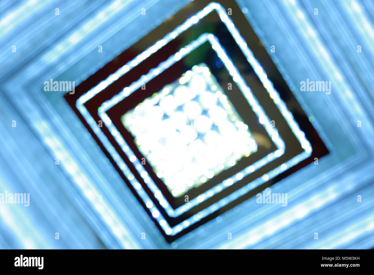 Abstract blue light blurry frame with white background Stock Photo - Alamy