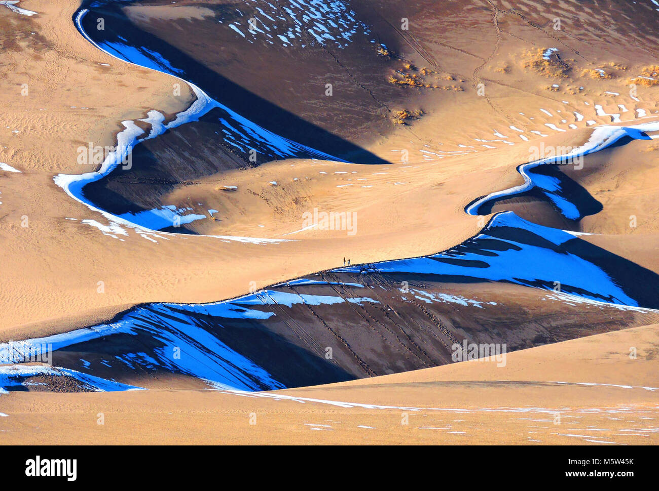 Snow Patterns on Dunes Stock Photo - Alamy