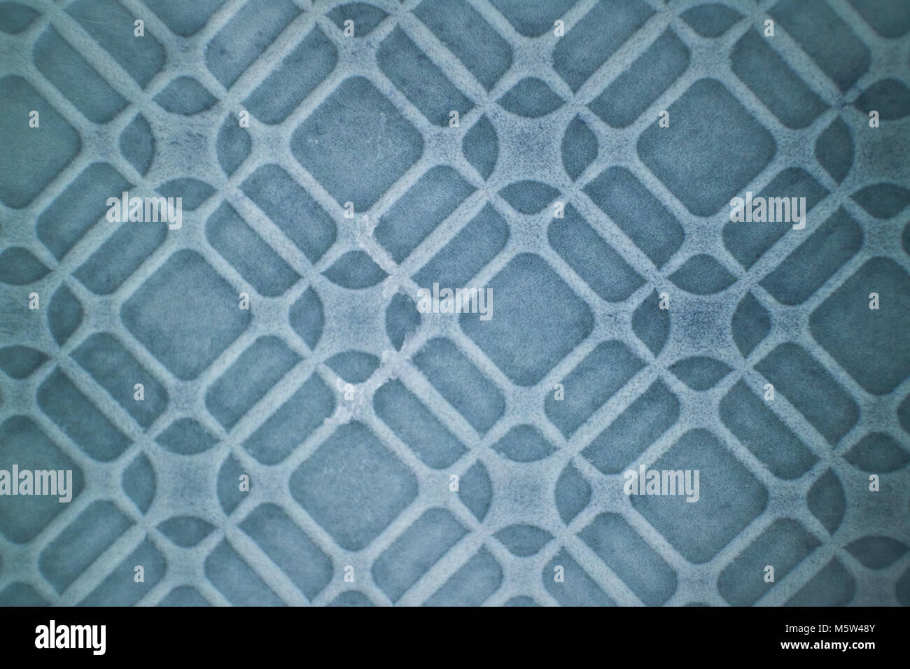 Decorative pattern on ceramic blue tile Stock Photo - Alamy