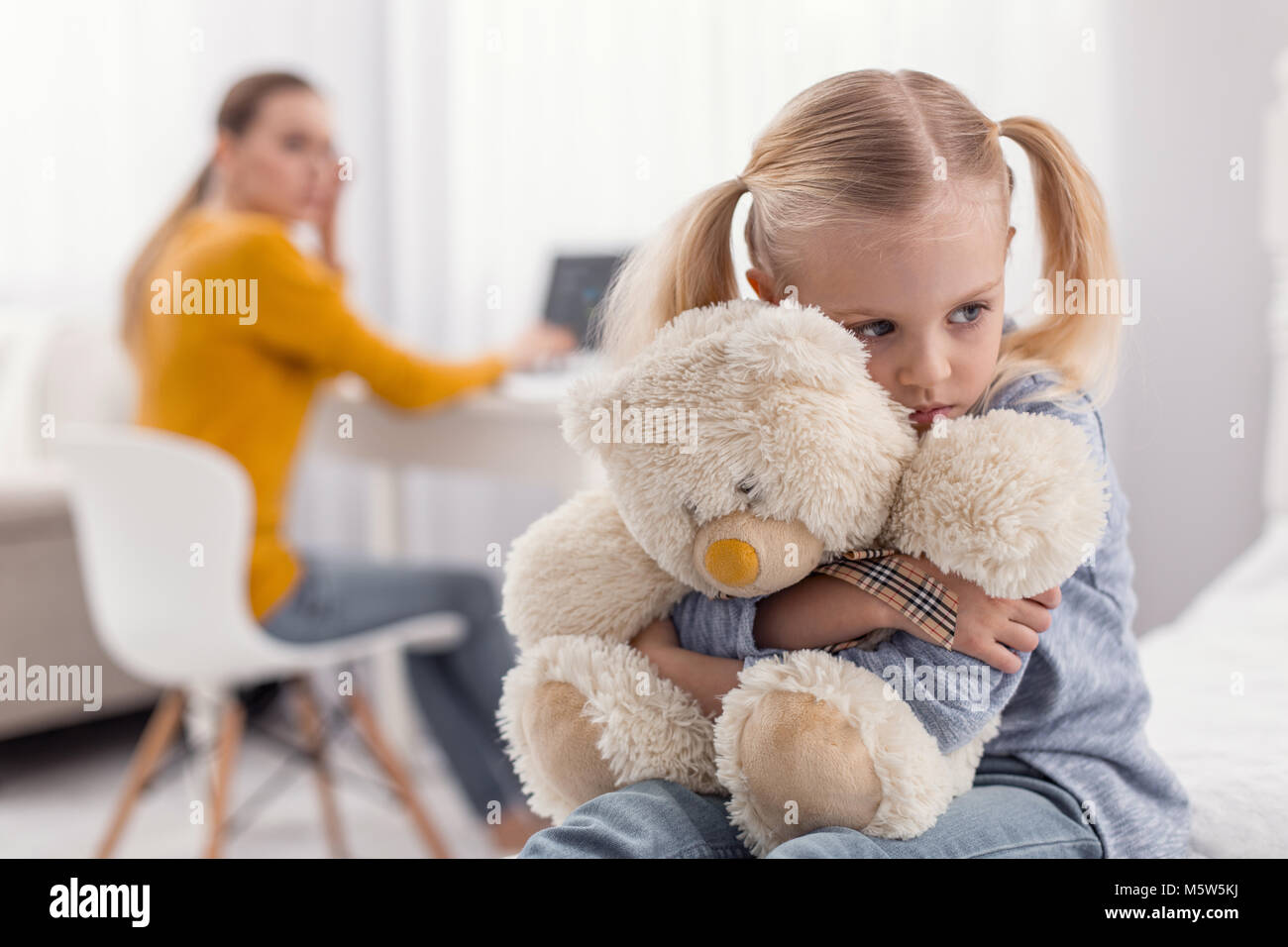 Sad lonely girl leaving alone Stock Photo - Alamy