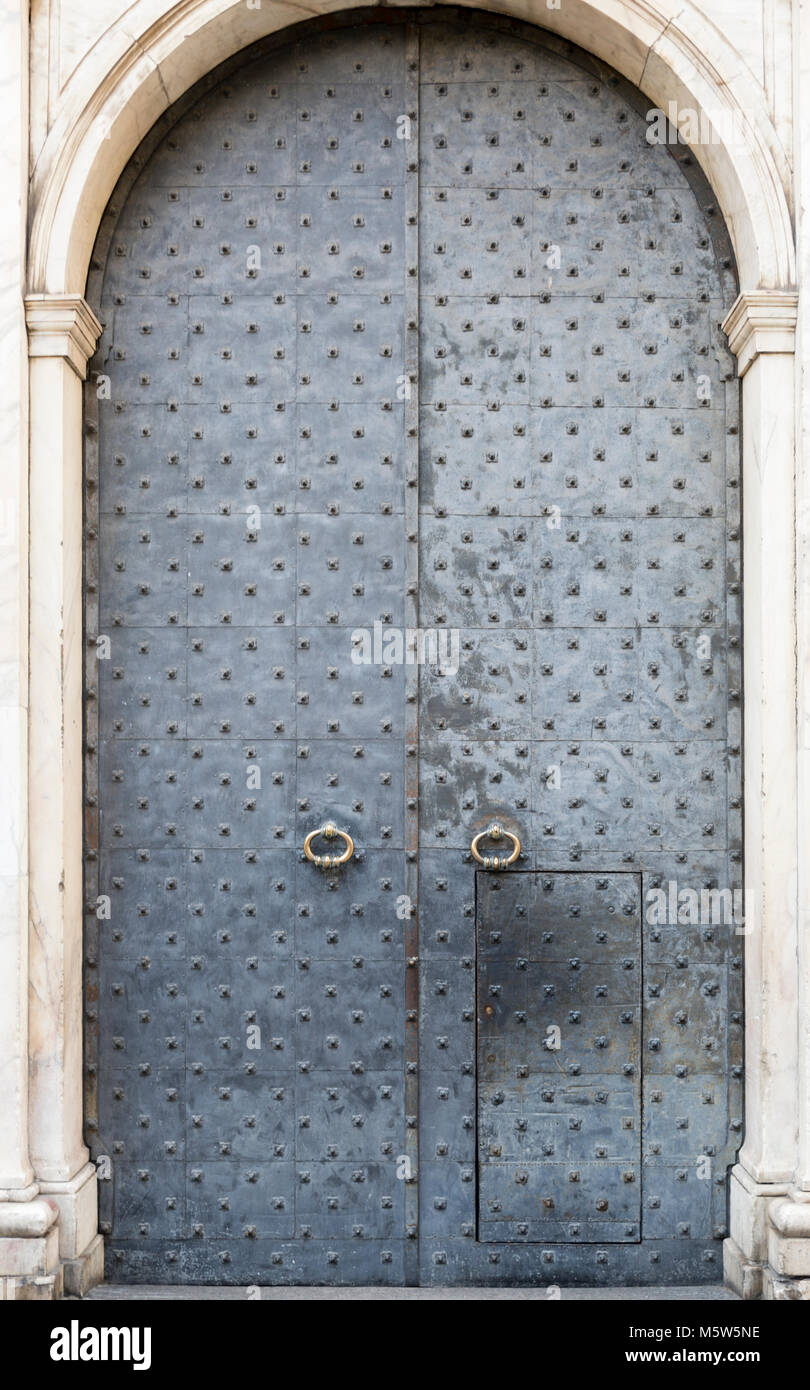 Great front door of an ancient palace of Genoa Stock Photo - Alamy