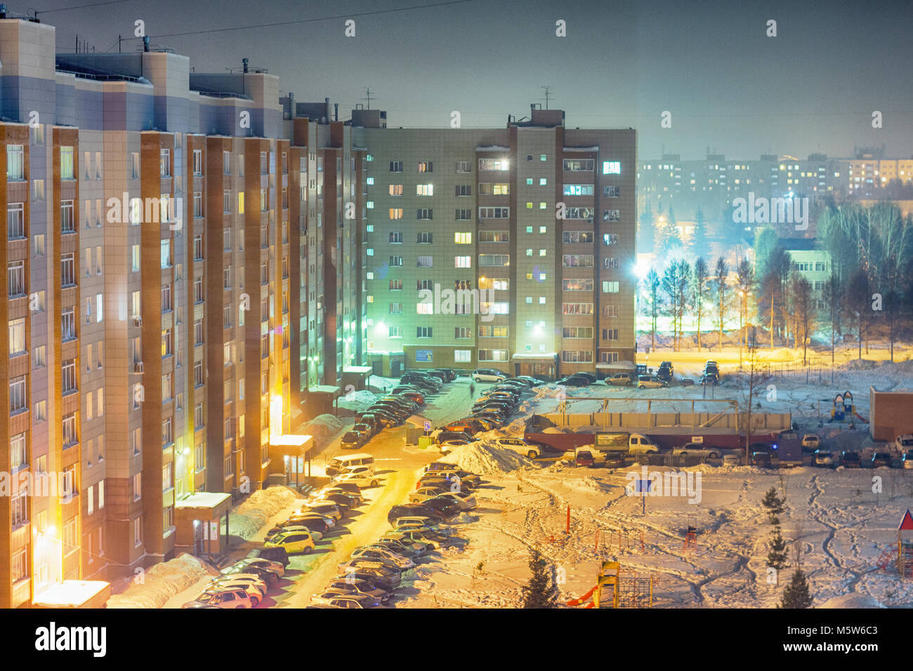 night cityscape . residential high-rise building and inner courtyard ...
