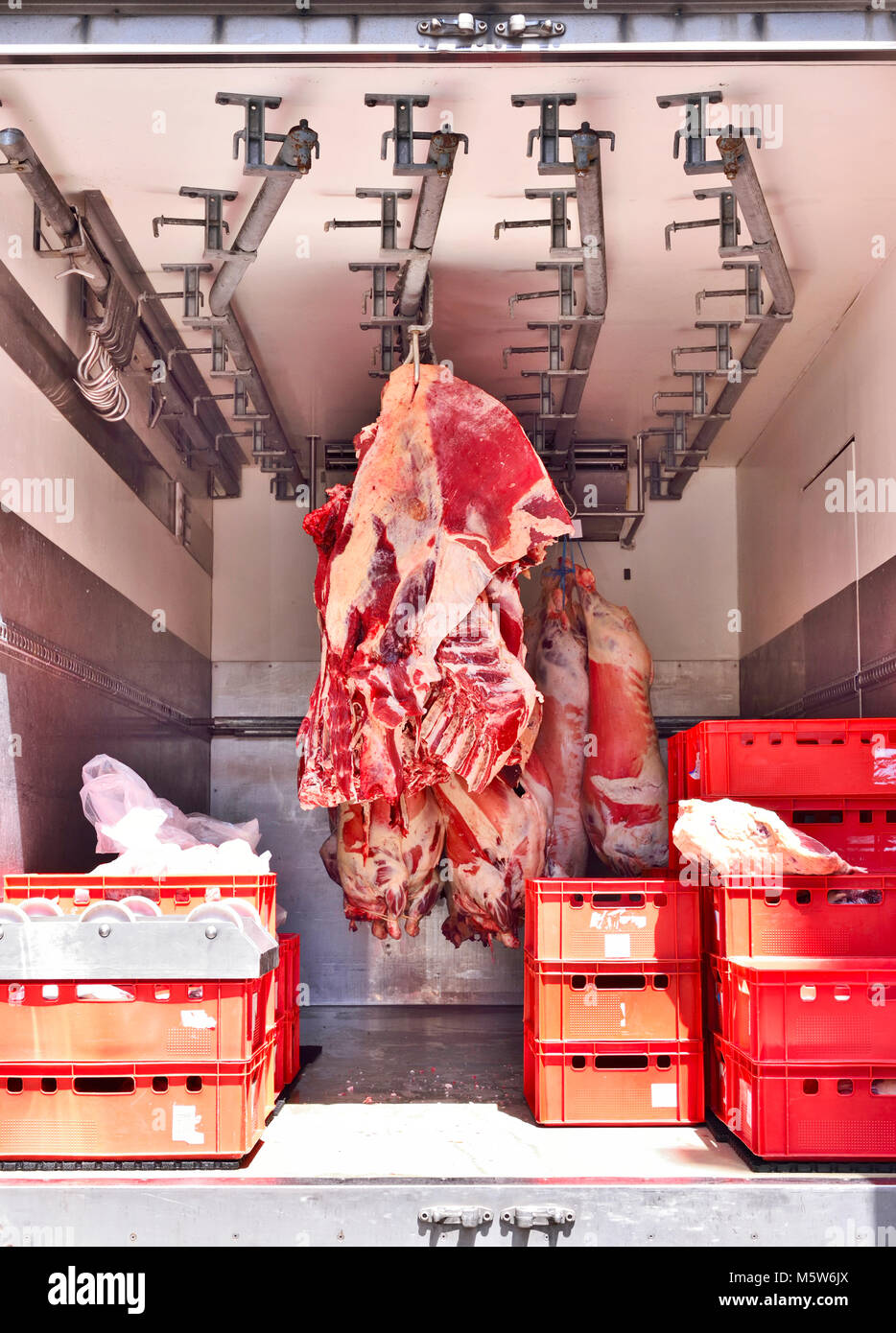 Food delivery of raw beef or pork, half beef in a cooling truck. Fresh ...