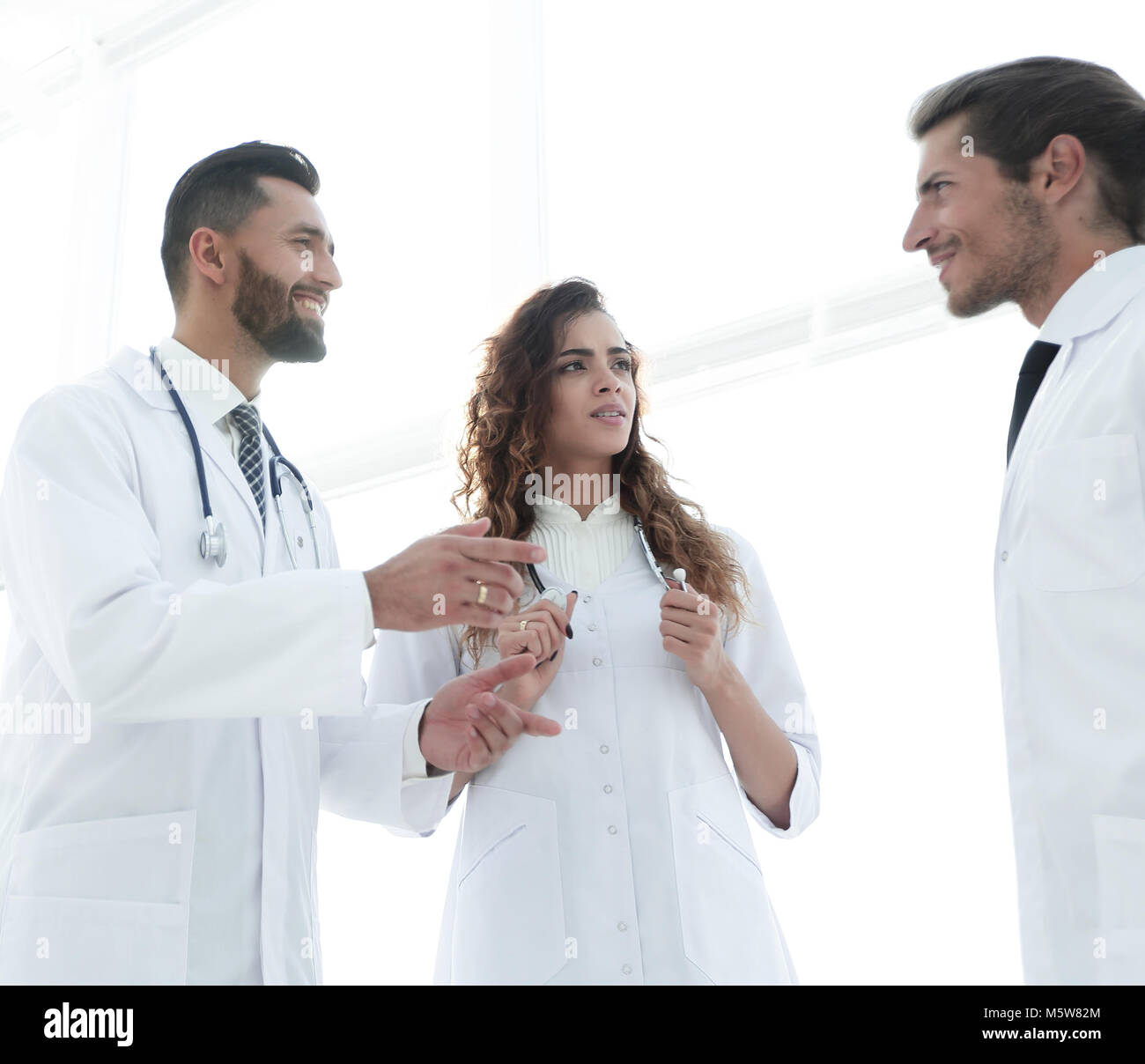 group of doctors discussing in hospital Stock Photo - Alamy