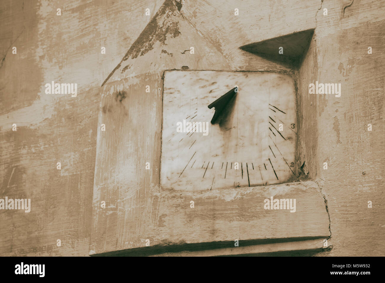 and the gnomon in the antique broken wall Stock Photo - Alamy