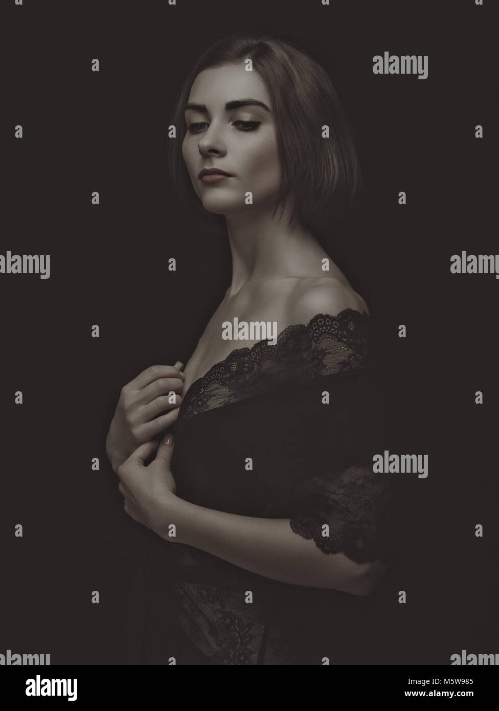 Dramatic female portrait against dark backgrounds Stock Photo - Alamy