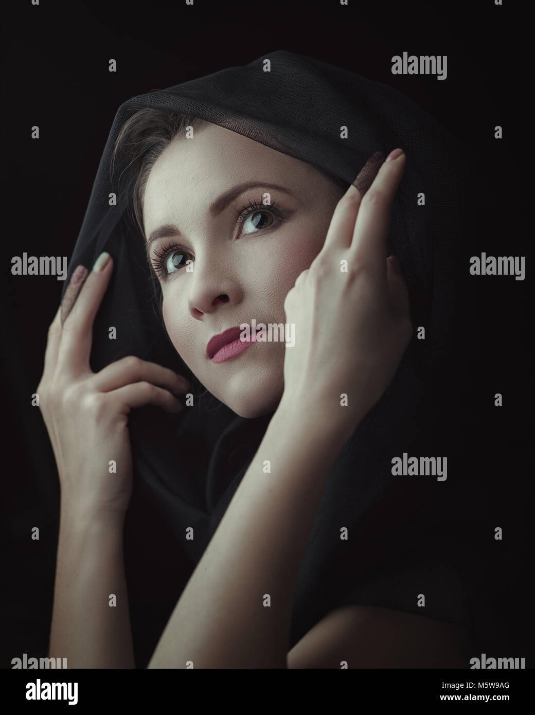 Dramatic female portrait against dark backgrounds Stock Photo - Alamy