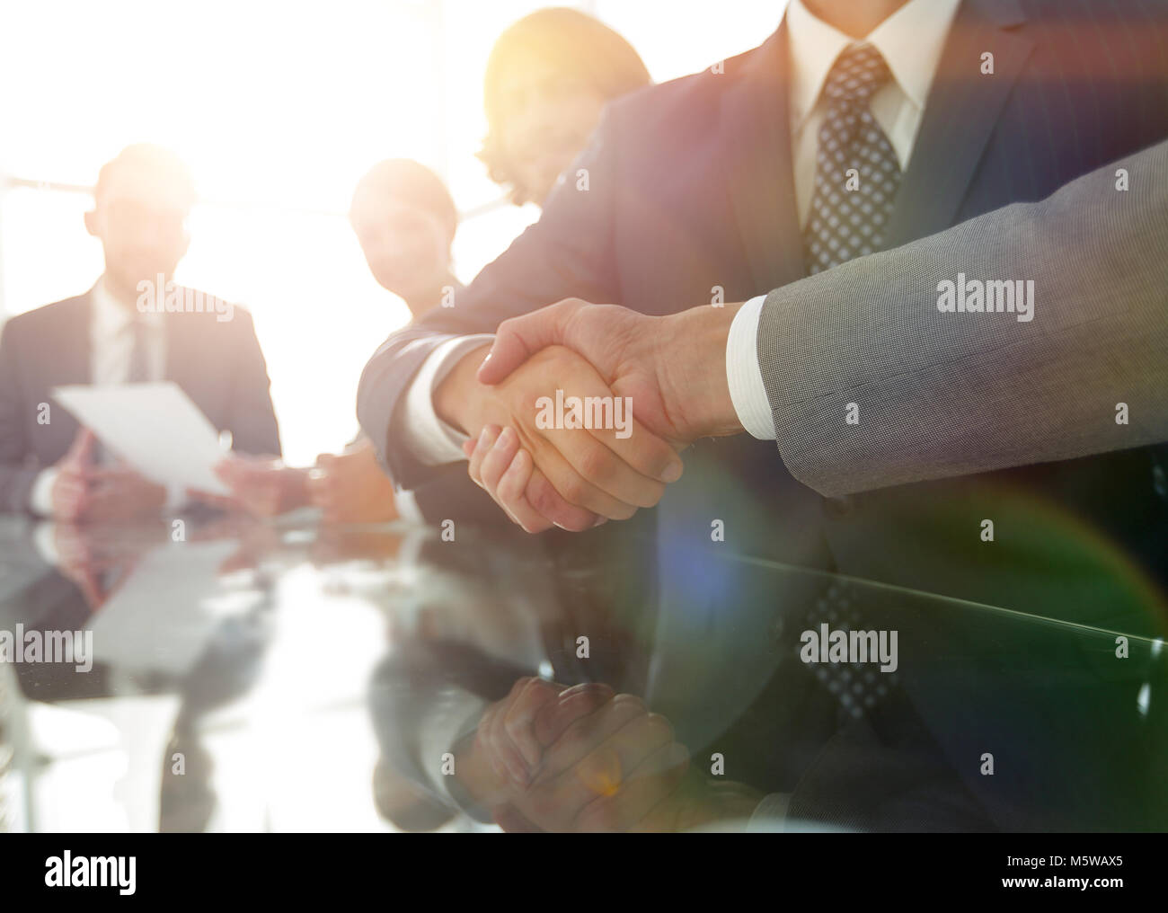 handshake business partners at the meeting Stock Photo - Alamy