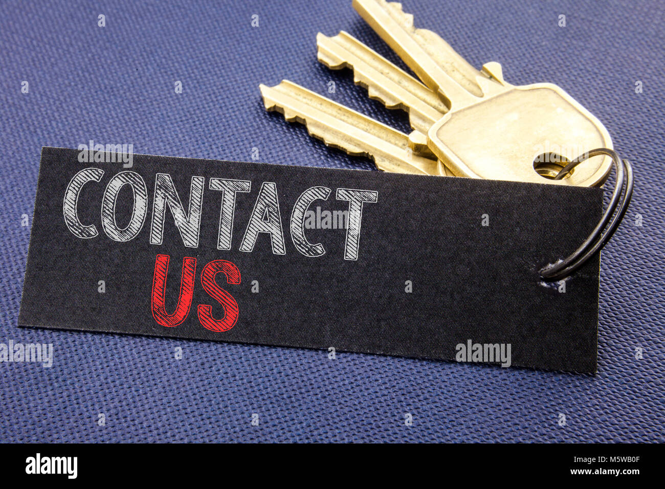 Handwritten text showing Contact Us. Business concept writing for ...