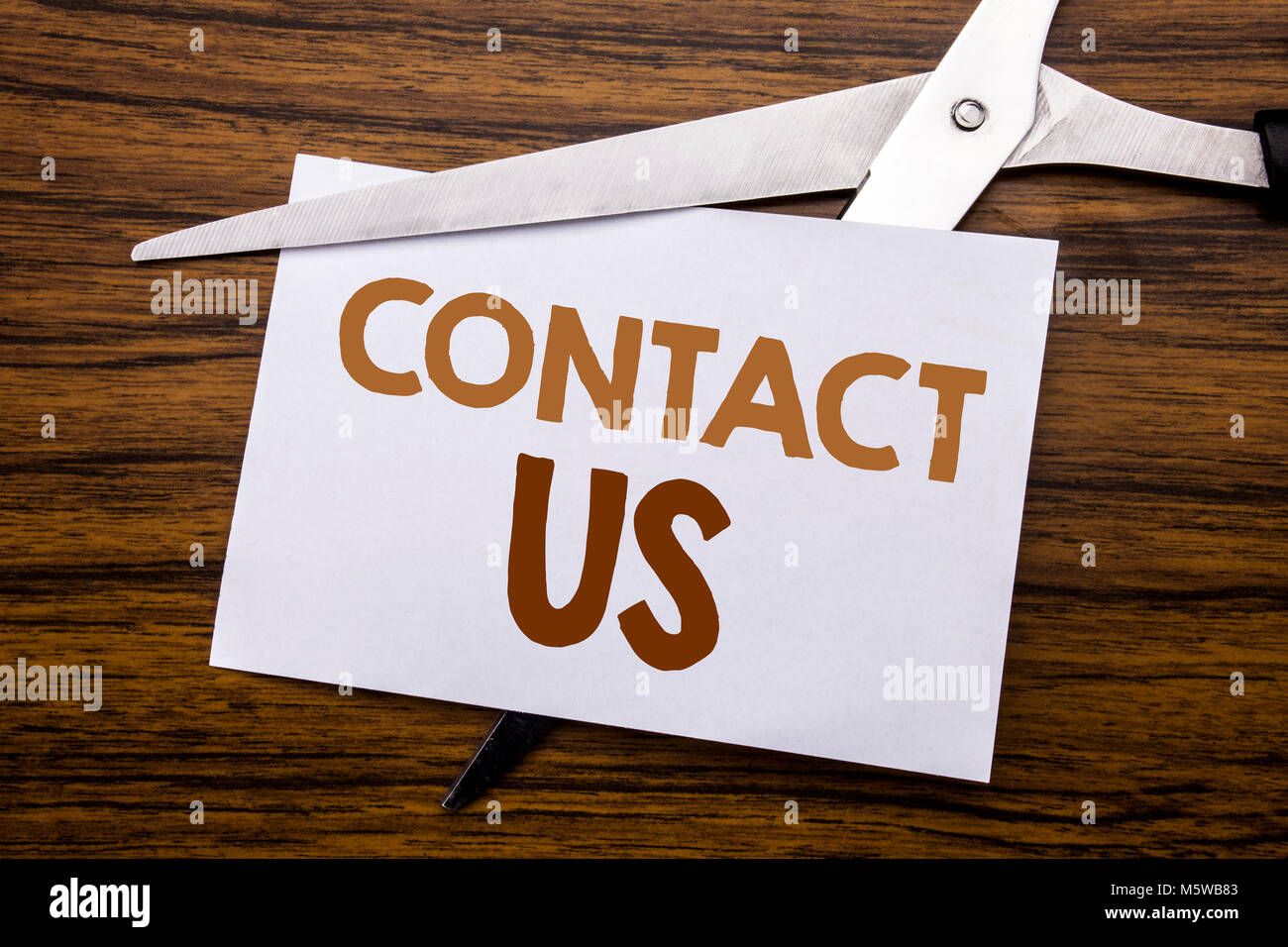 Hand writing text caption inspiration showing Contact Us. Business ...