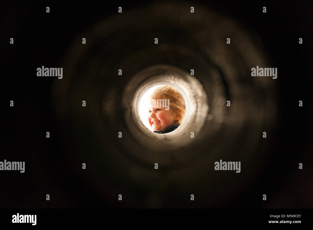 Child / kid / visiting HMS Warrior seen through barrel of Armstrong ...