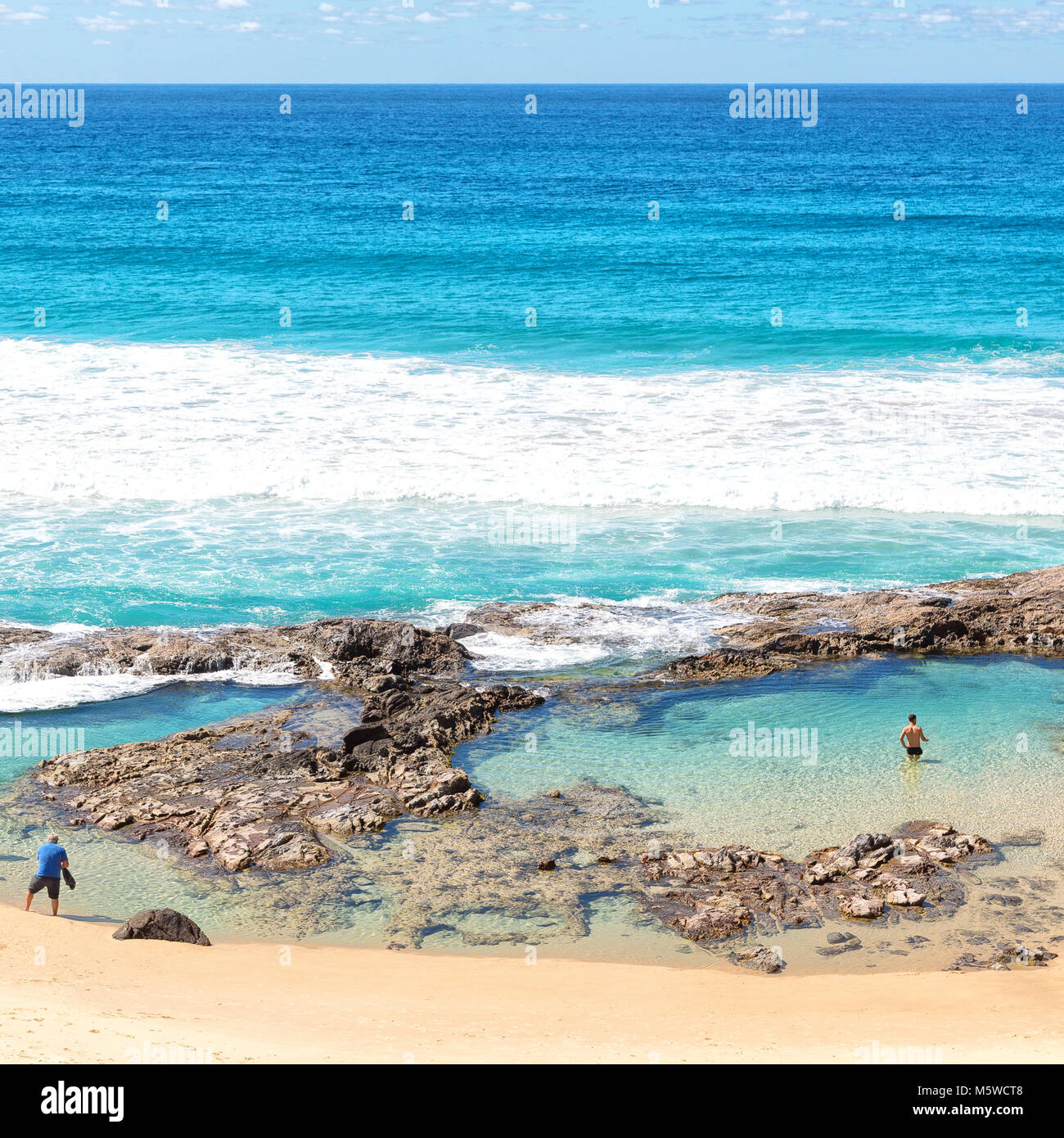 in australia fraser island the beach near the rocks in the wave of ...