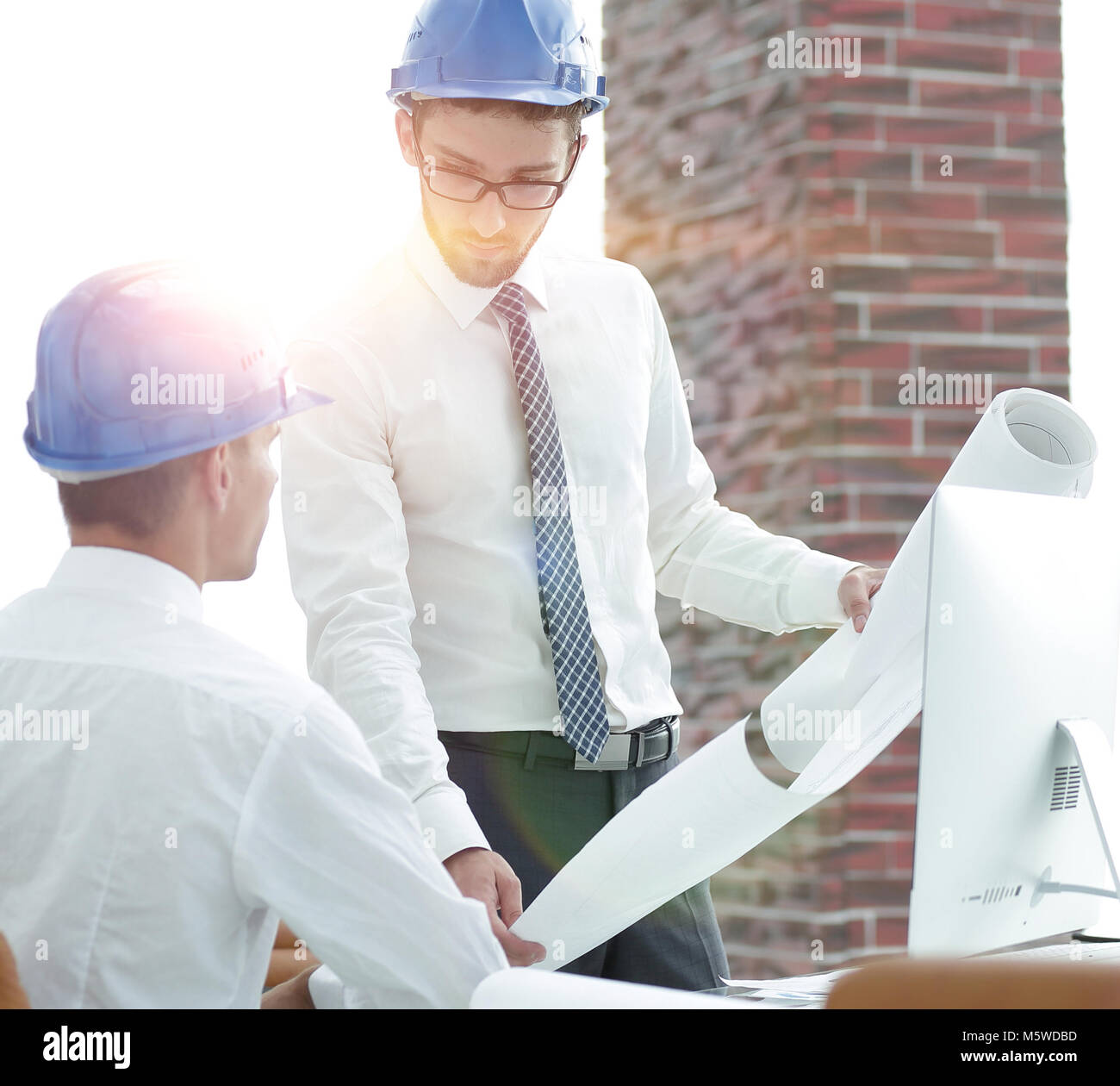 architect and engineer, considering a building project Stock Photo - Alamy