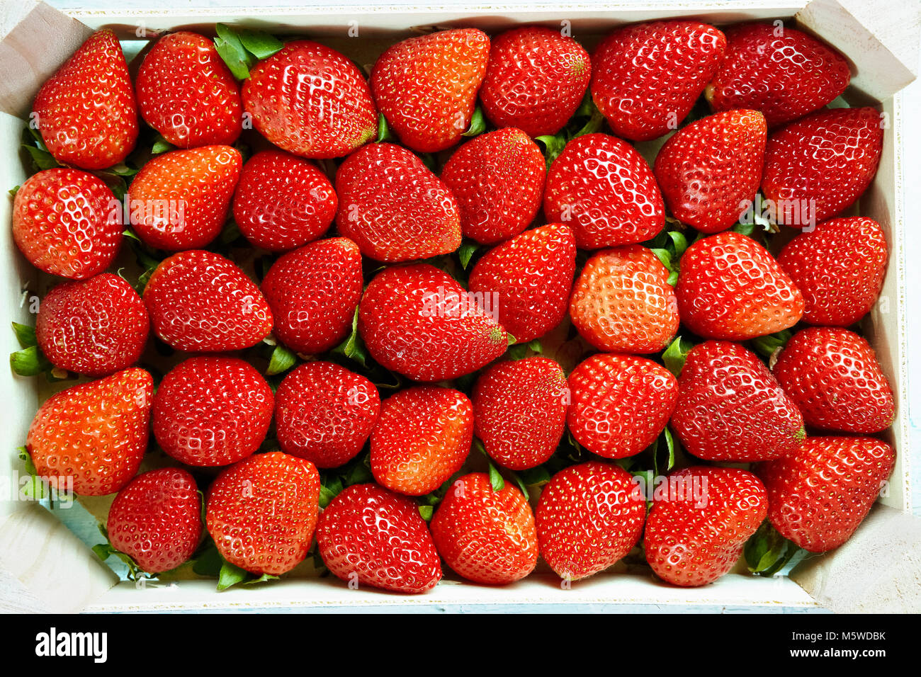 Strawberry background top view Stock Photo - Alamy