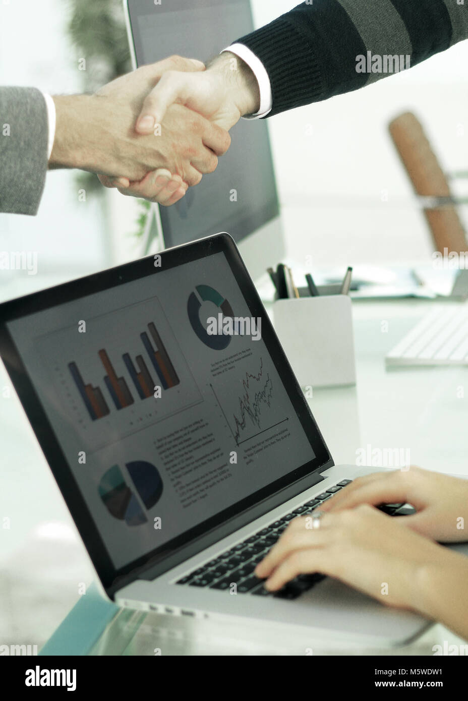 closeup.background image handshake financial partners Stock Photo - Alamy