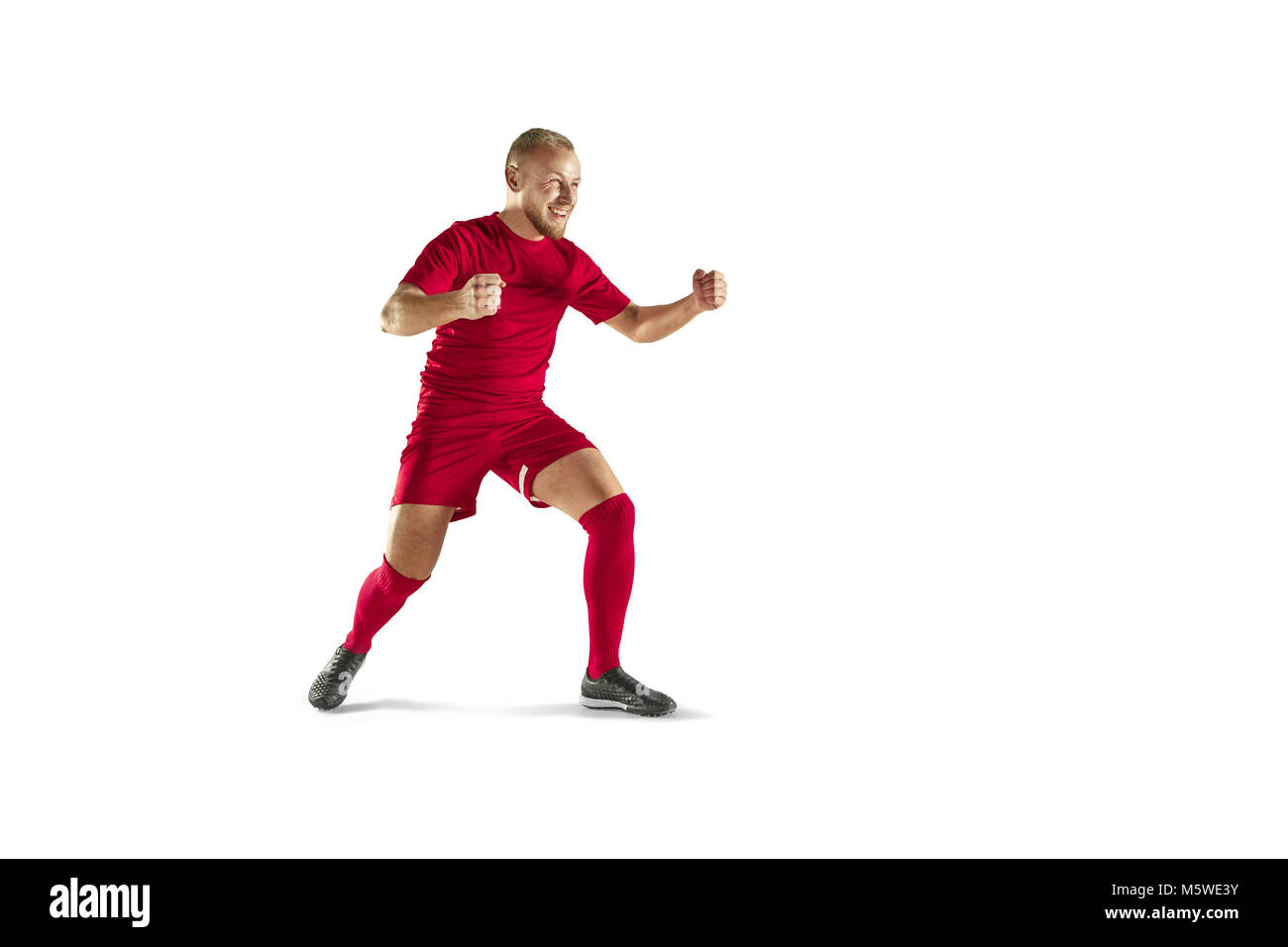 Happiness football player after goal Stock Photo - Alamy